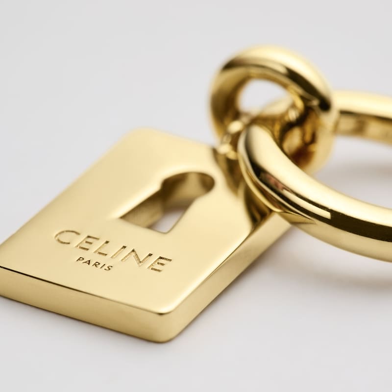 CELINE CHARMS LOCK EARRING IN BRASS WITH GOLD FINISH - GOLD | CELINE